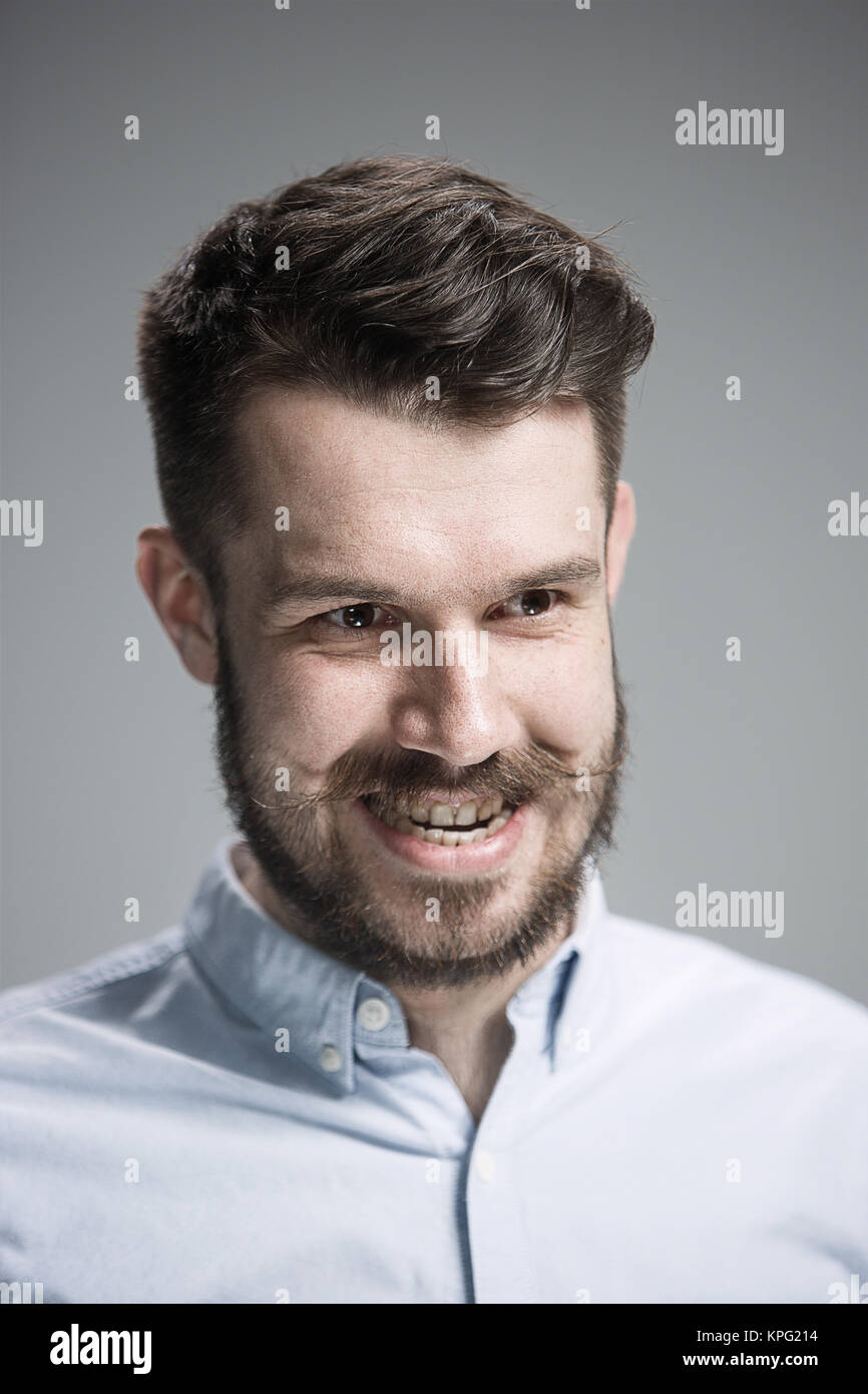 Close up face of angry man Stock Photo - Alamy
