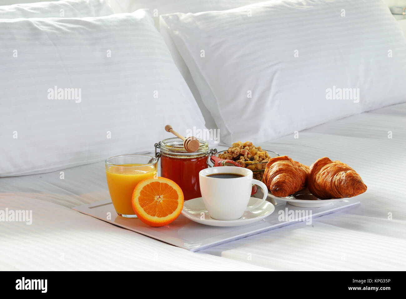 Breakfast in bed in hotel room Stock Photo - Alamy