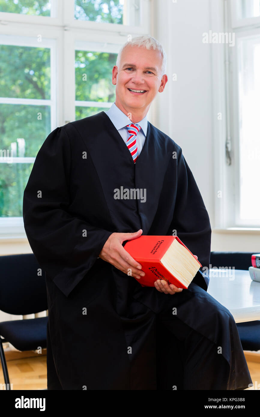 rechtswanwalt in his office Stock Photo - Alamy