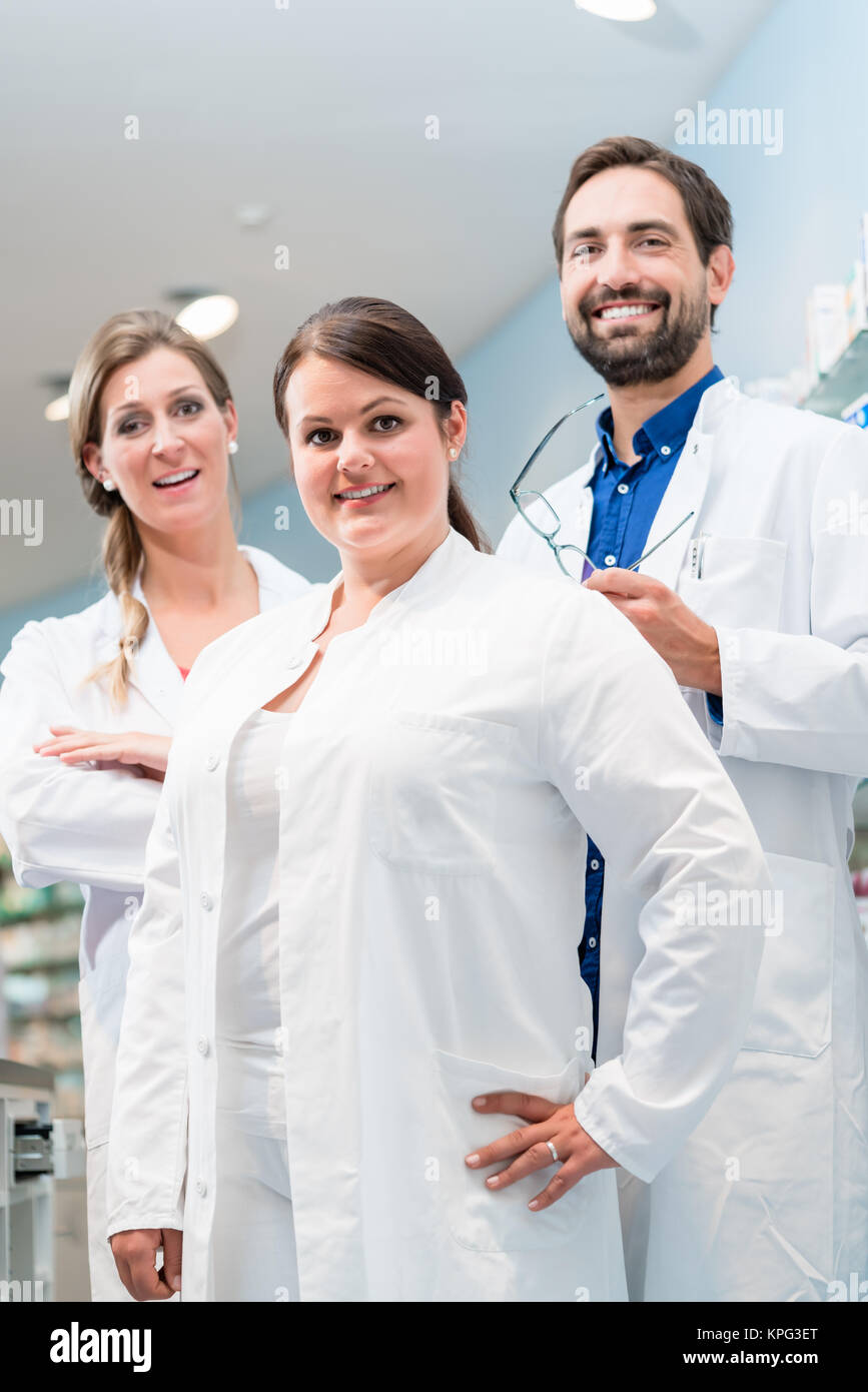 team of pharmacists in pharmacy Stock Photo - Alamy