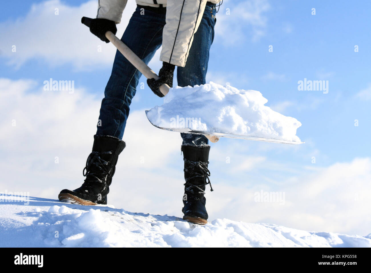 Manual snow removal Stock Photo - Alamy