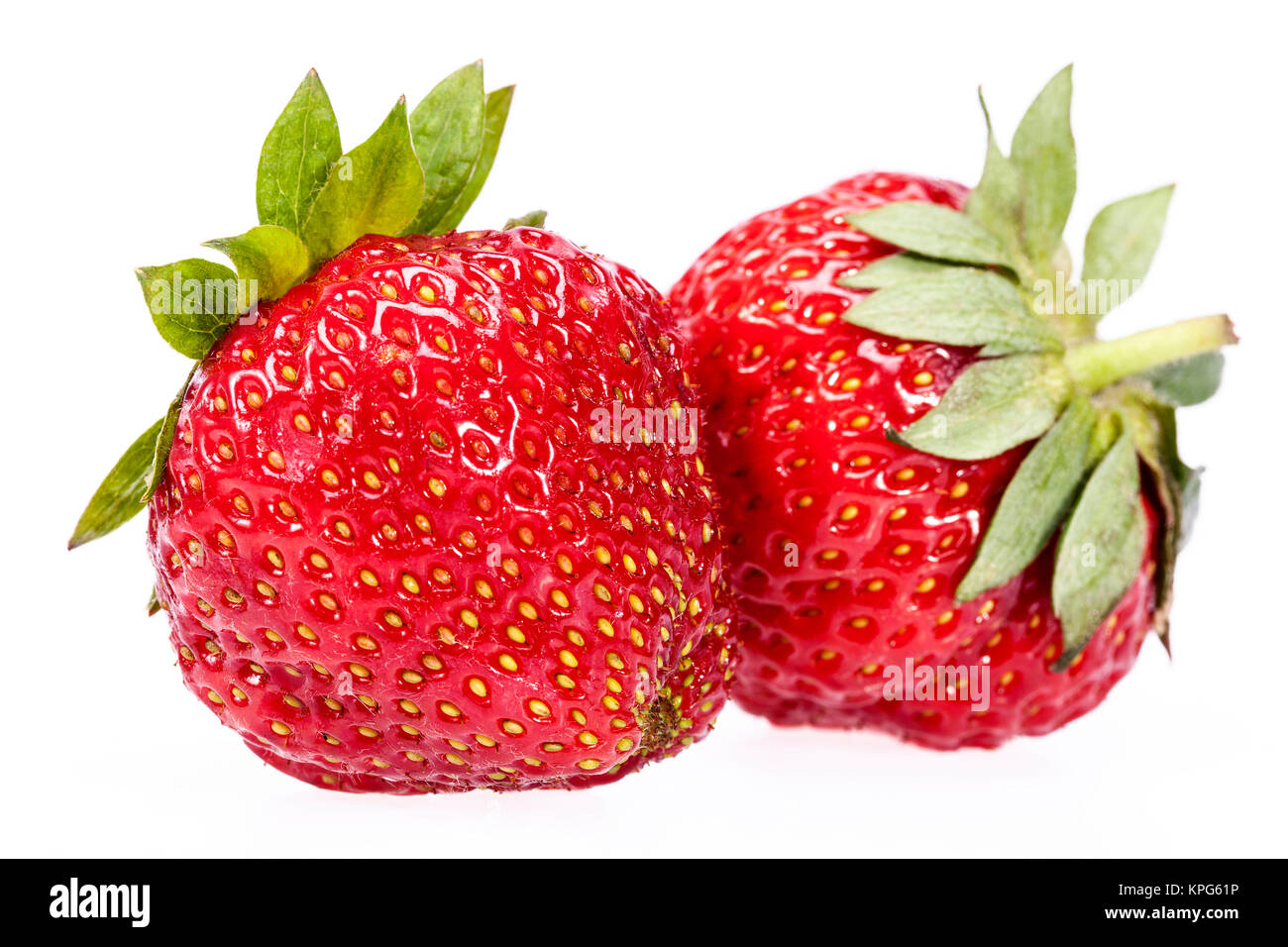 two strawberries isolated on white background close up Stock Photo - Alamy