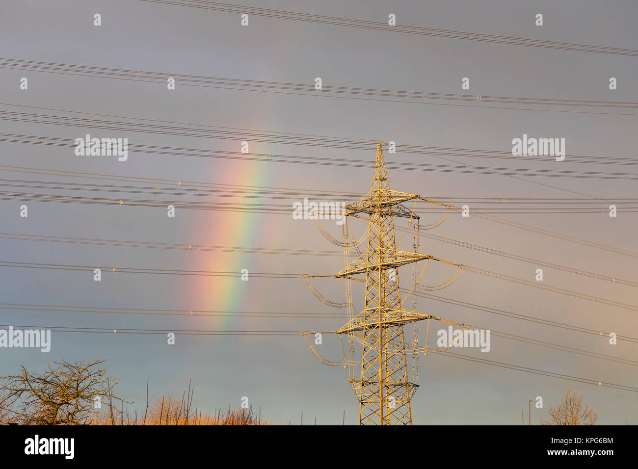 Power Grid and rainbow Stock Photo - Alamy