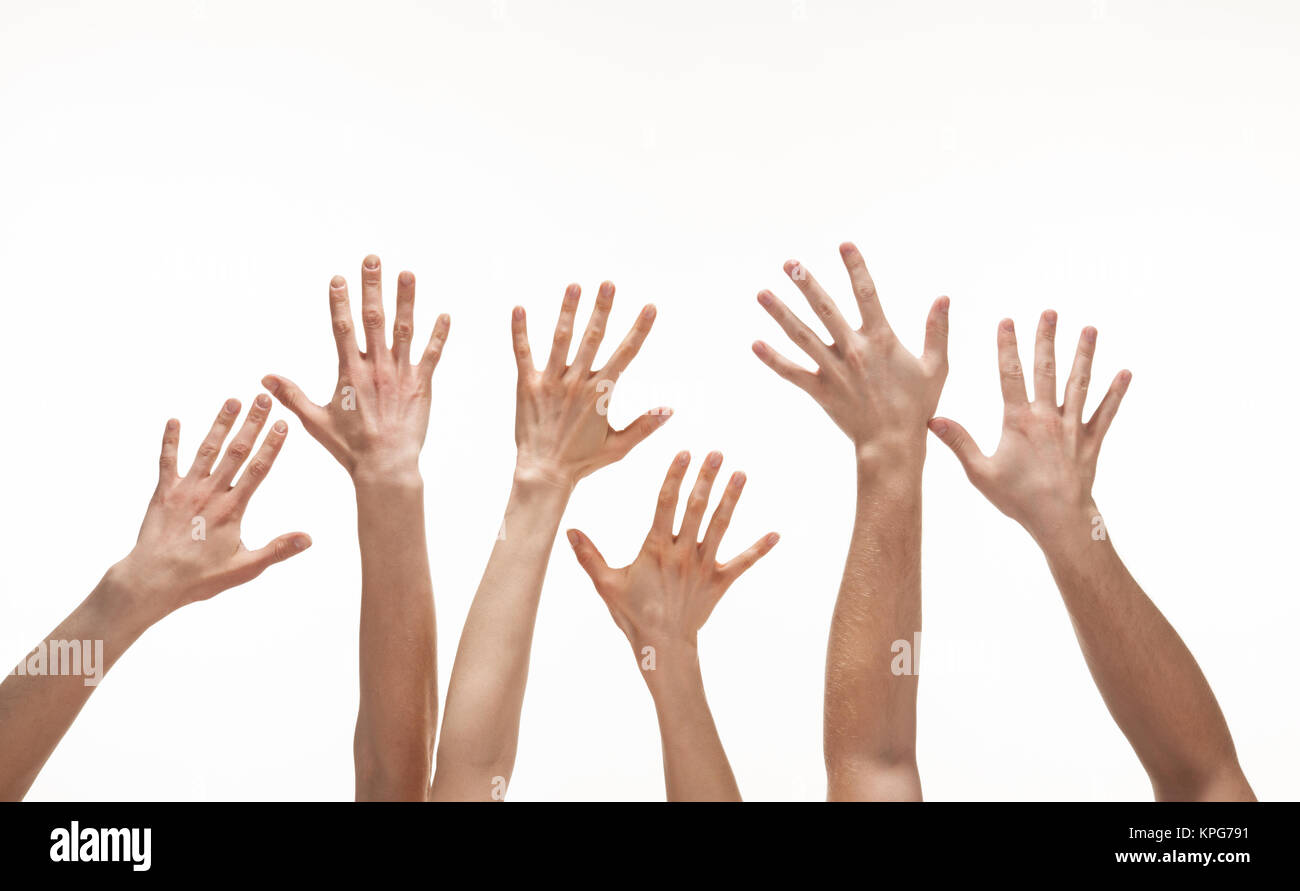 Many hands reaching out in the air Stock Photo - Alamy