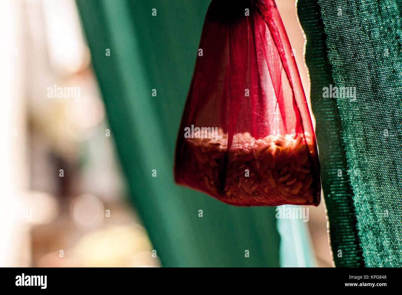 Bag of Rice symbol of abundance and good luck Stock Photo - Alamy