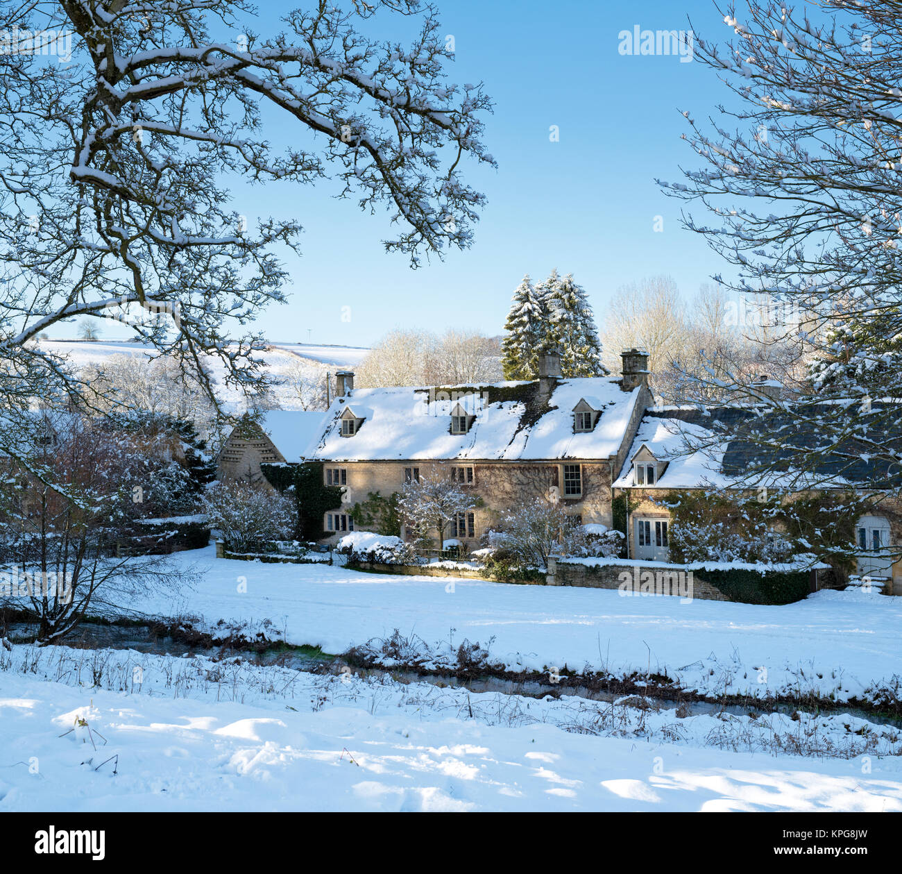 Upper Slaughter farmhouse in the snow in December. Upper Slaughter ...