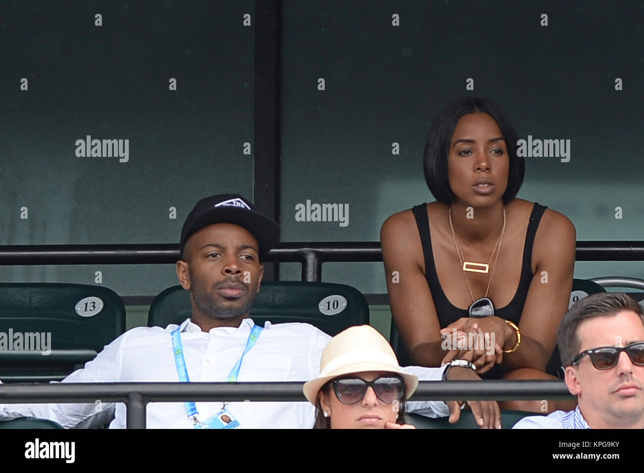 KEY BISCAYNE, FL - MARCH 22: Tim Witherspoon; Kelly Rowland during the ...