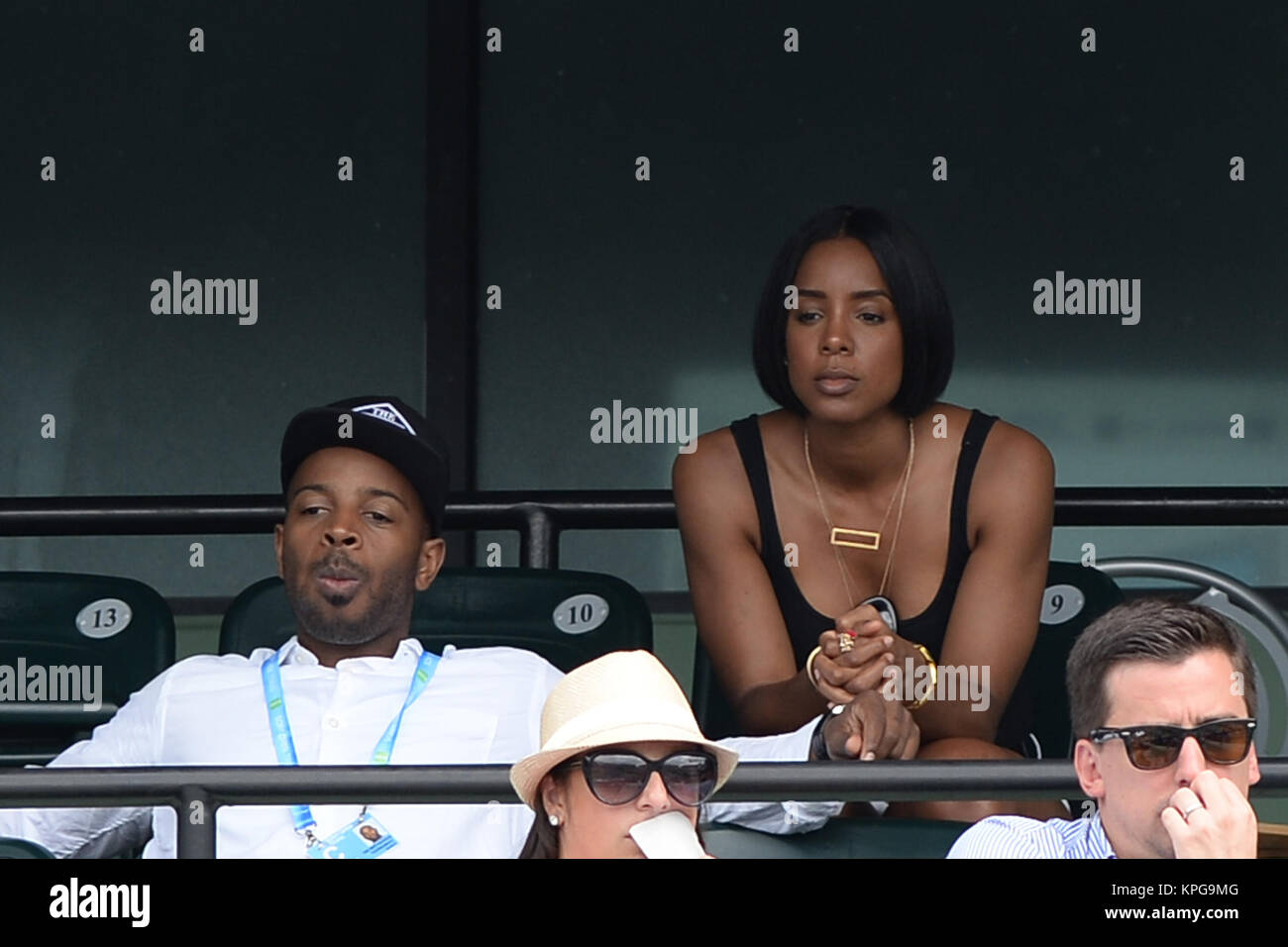 KEY BISCAYNE, FL - MARCH 22: Tim Witherspoon; Kelly Rowland during the ...
