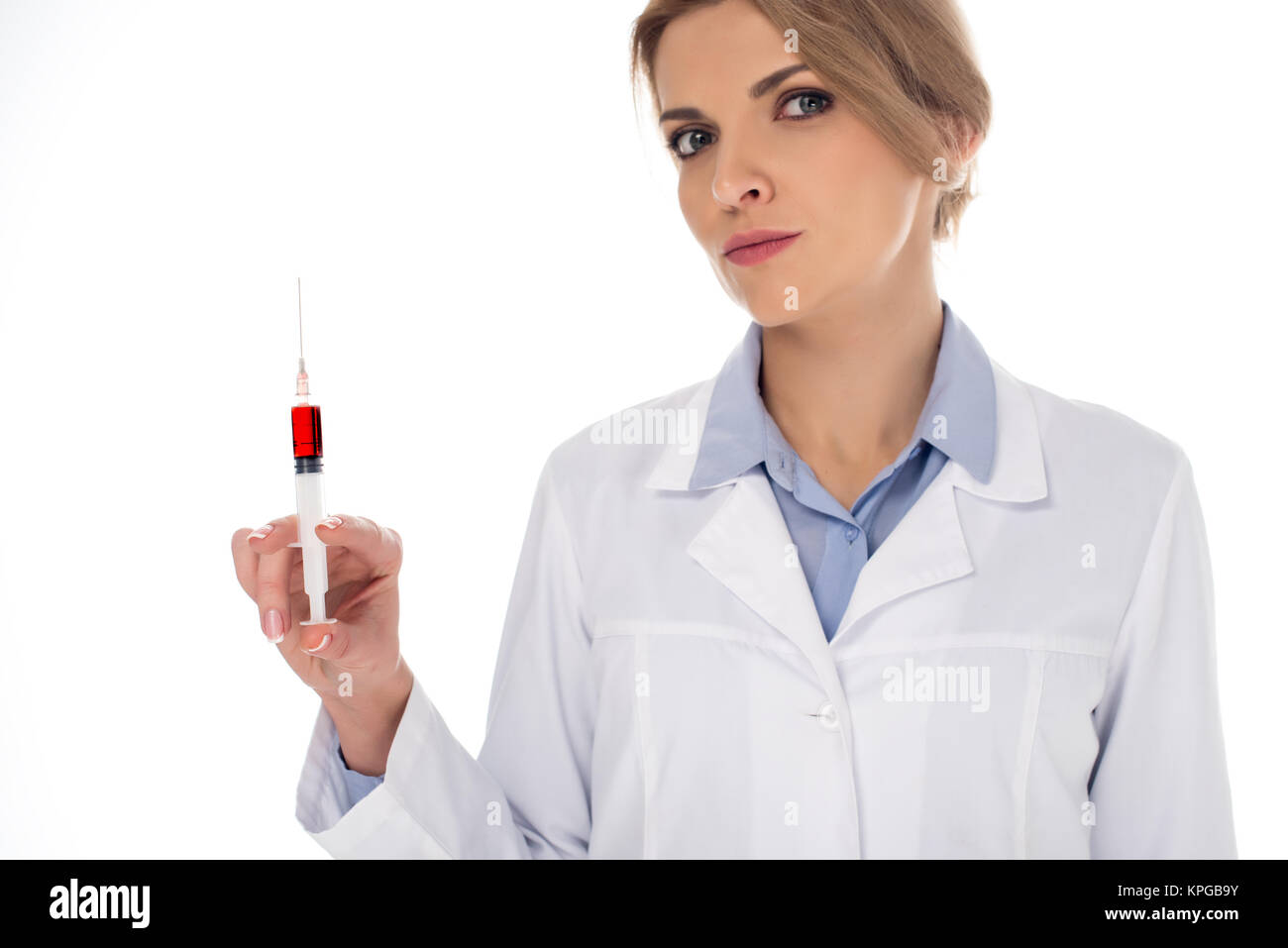 doctor with syringe of red liquid Stock Photo - Alamy