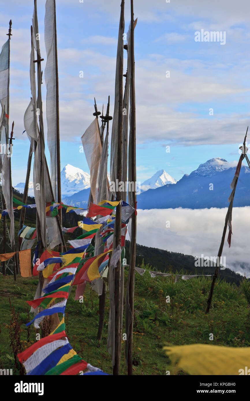 Asia, Bhutan. Mount Jumolhari at 7,300m seen through prayer flags from ...