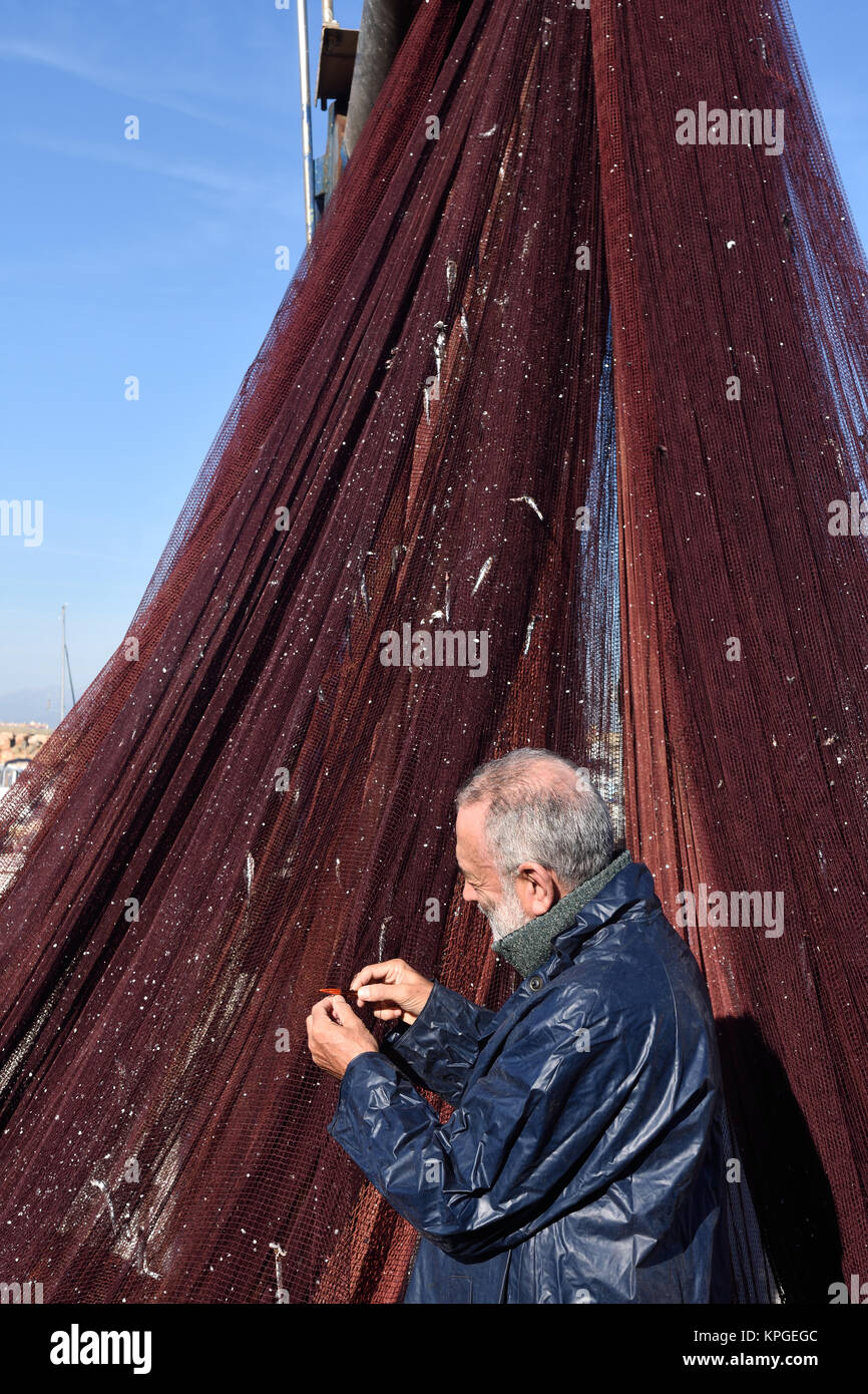 fisherman working in the sea Stock Photo - Alamy