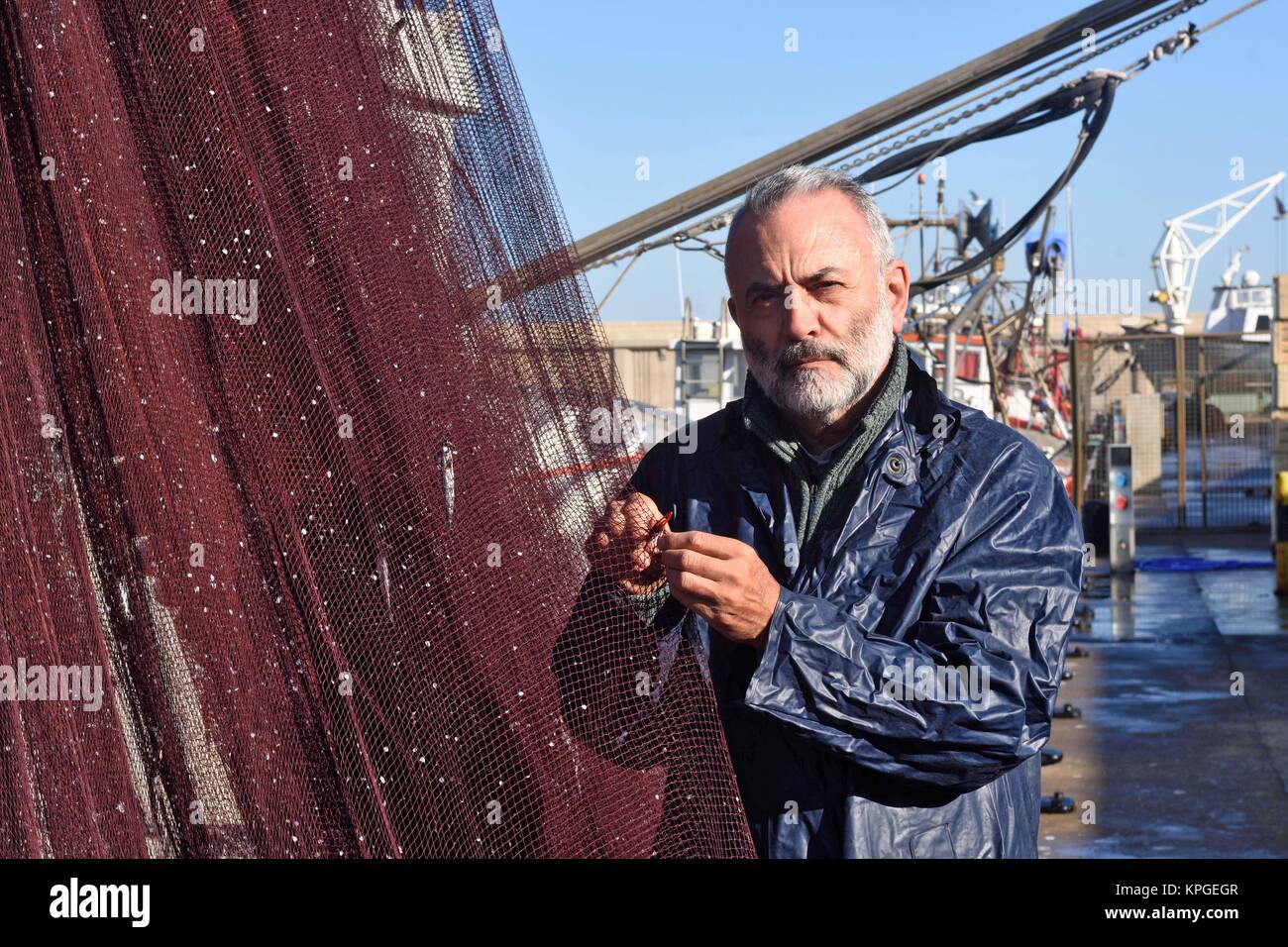 fisherman working in the sea Stock Photo - Alamy