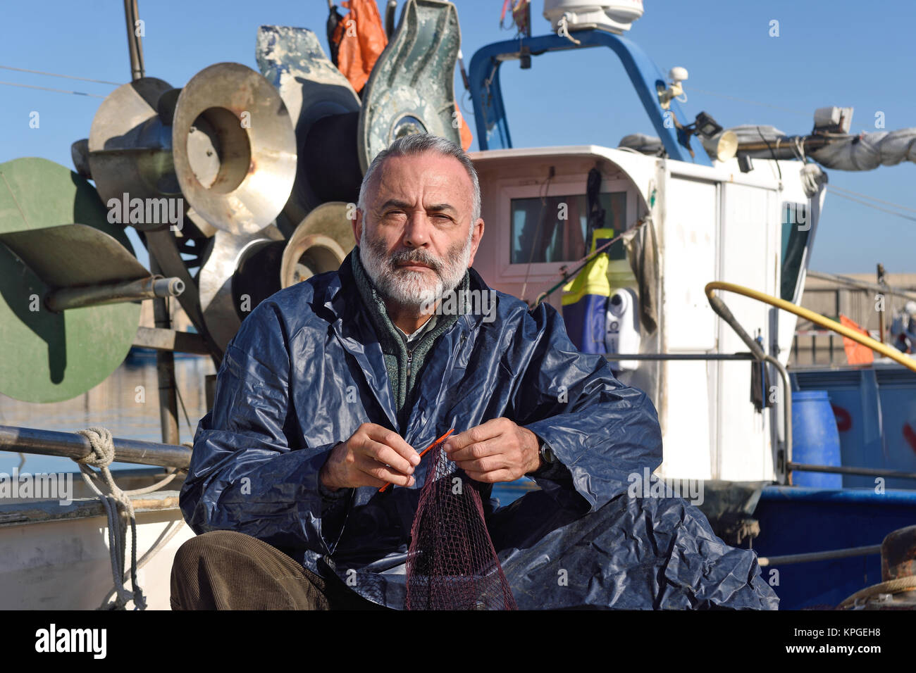 fisherman working in the sea Stock Photo - Alamy
