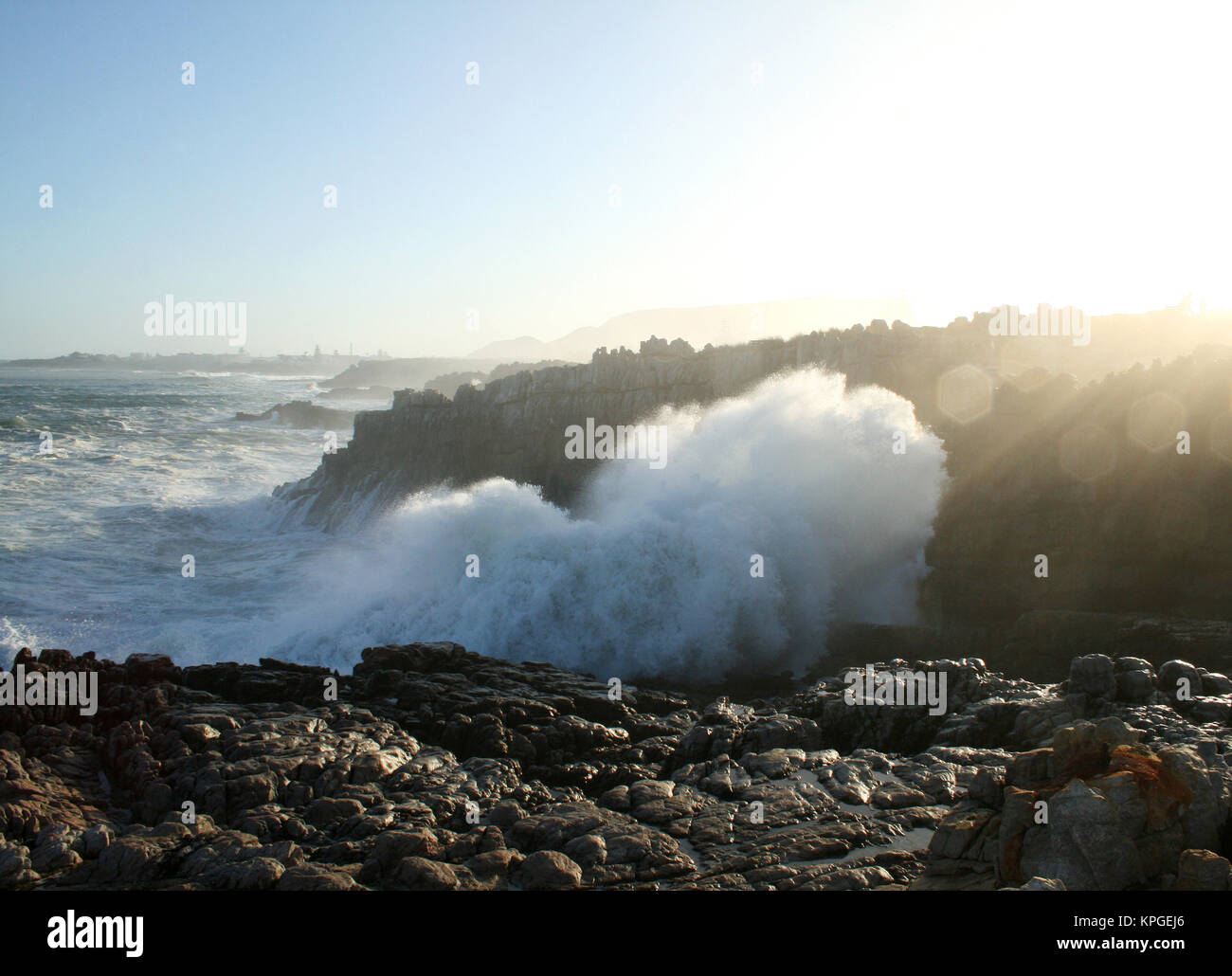Wave breaking over rocks, Splash Rock, Hermanus, South Africa Stock ...