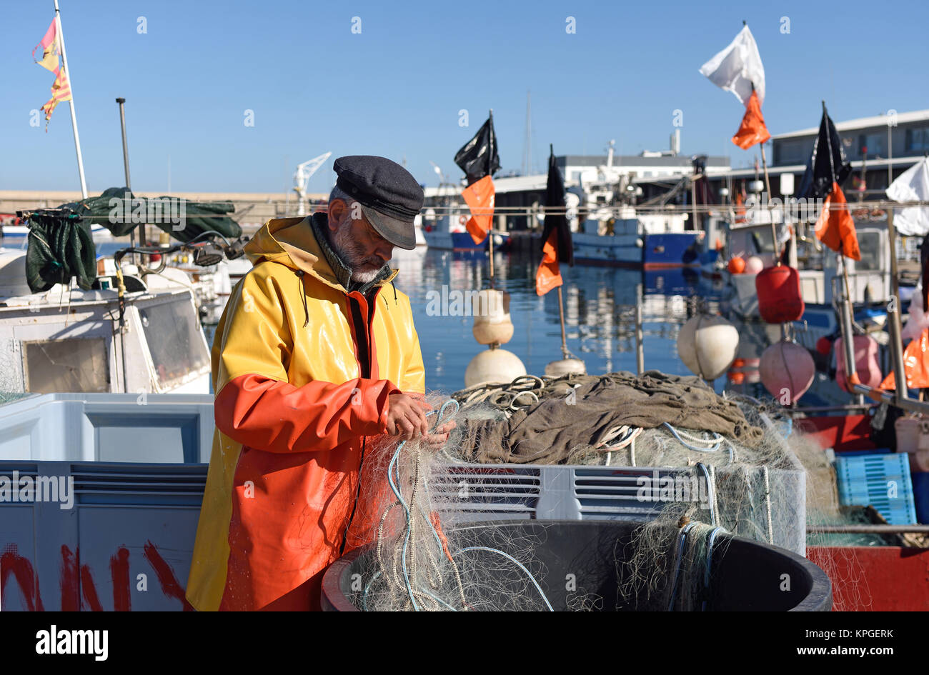 fisherman working in the sea Stock Photo - Alamy