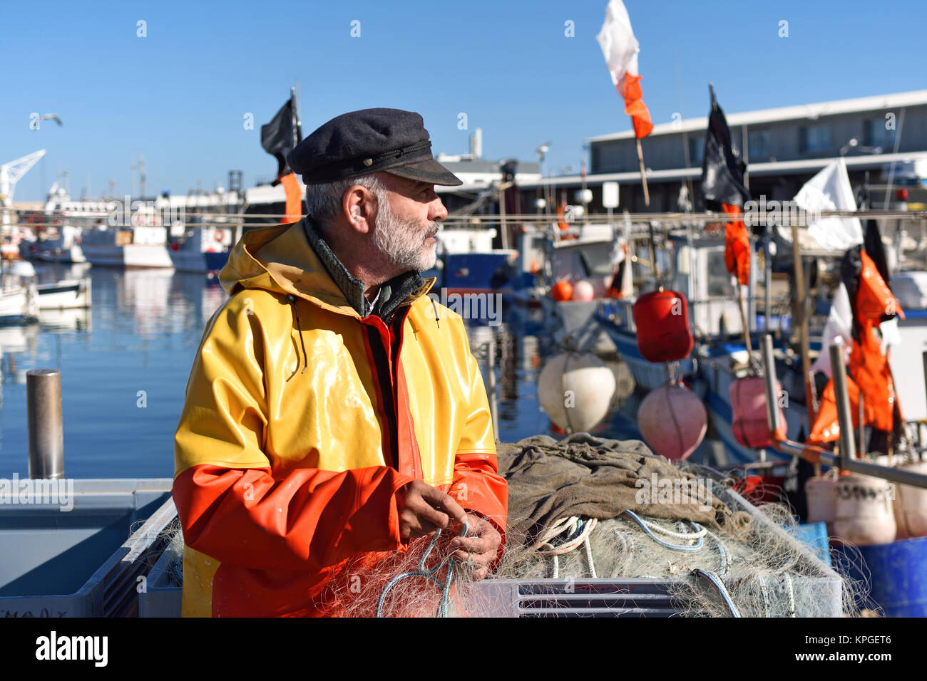 fisherman working in the sea Stock Photo - Alamy