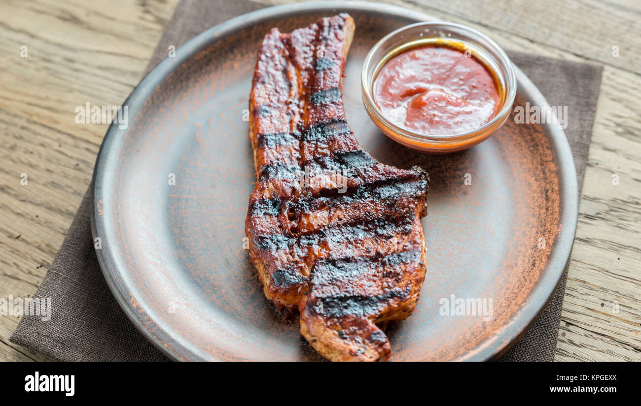 Portion of grilled pork ribs Stock Photo - Alamy