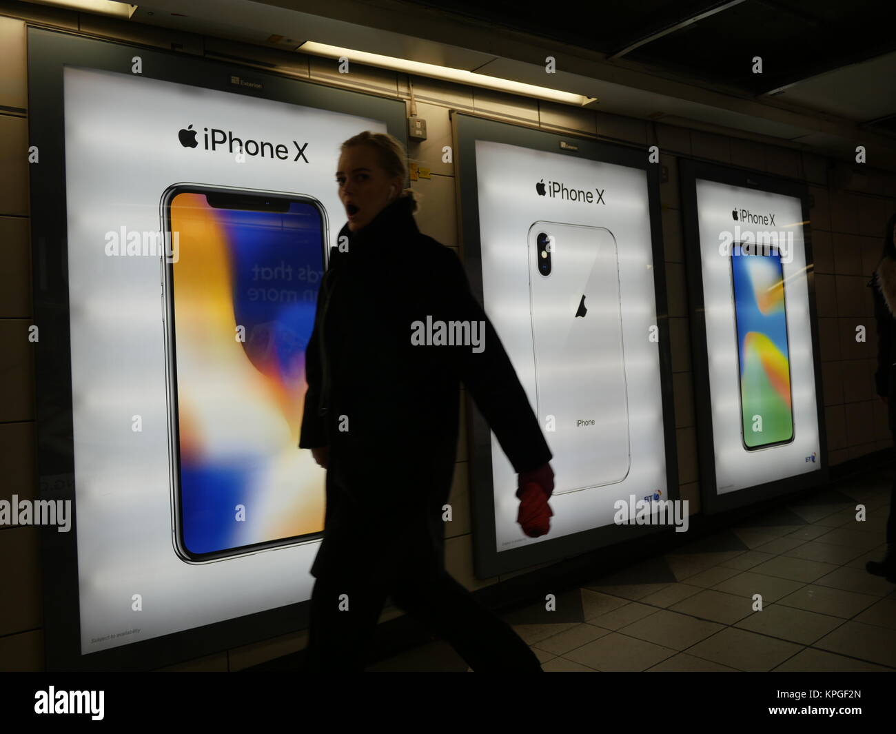 row of Iphone X adverts on illuminated posters, Central London, UK ...