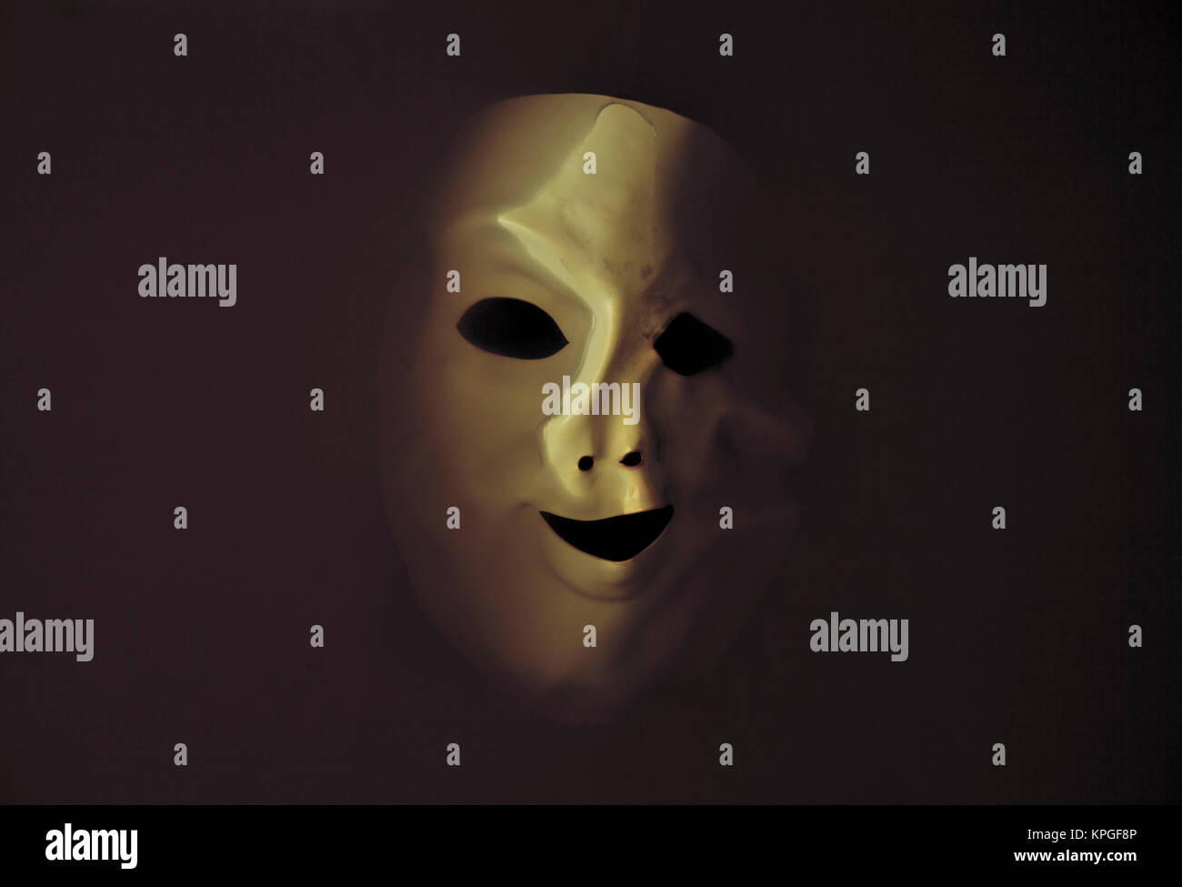 Deformed scary mask in the dark water Stock Photo - Alamy