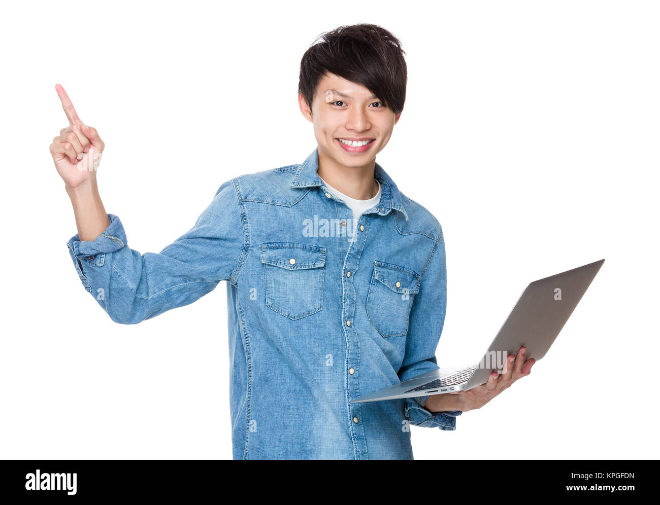 Man hold with notebook computer and finger pointing up Stock Photo - Alamy