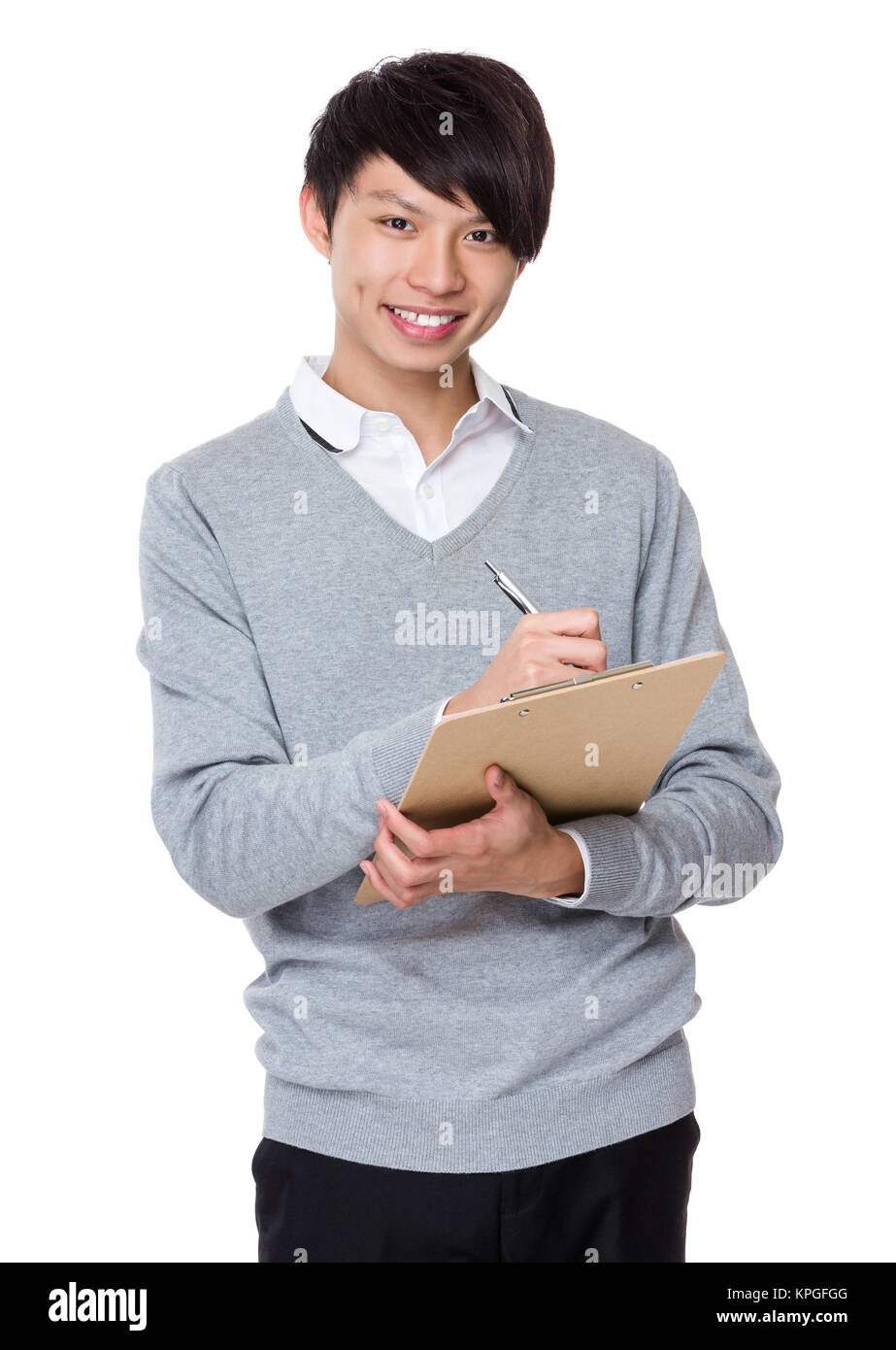 Businessman take note on clipboard Stock Photo - Alamy