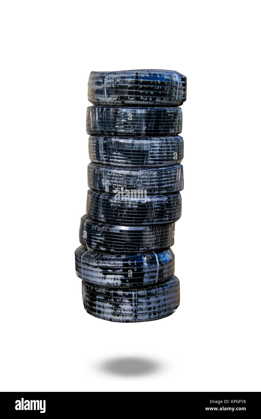 new tires inside plastic isolated on white background This has clipping ...