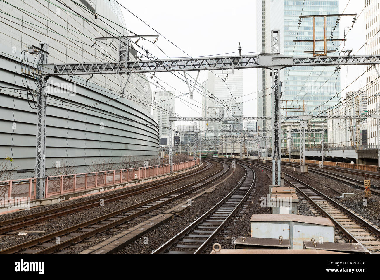 Railroad track in city Stock Photo - Alamy