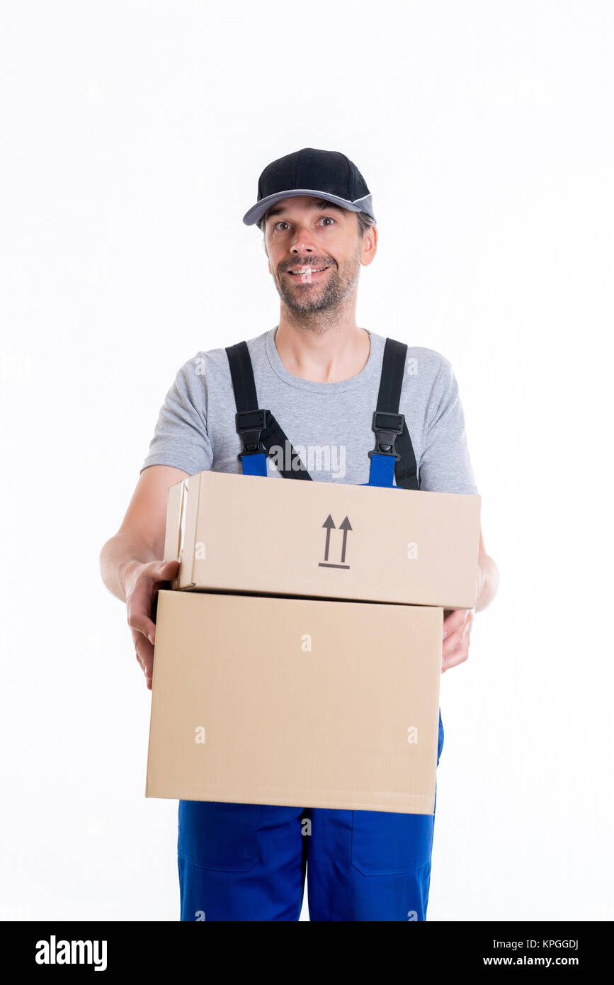friendly postman with parcels in front of white background Stock Photo ...