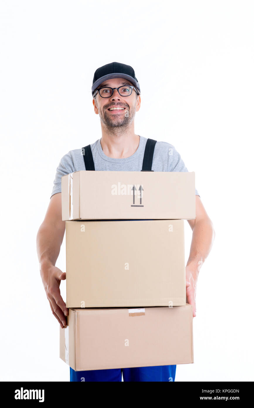 friendly postman with parcels in front of white background Stock Photo ...