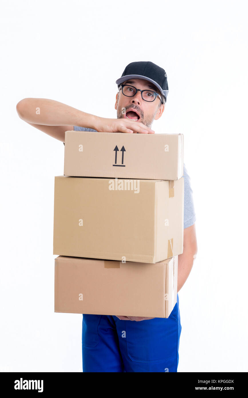 overstrained postman with parcels in front of white background Stock ...