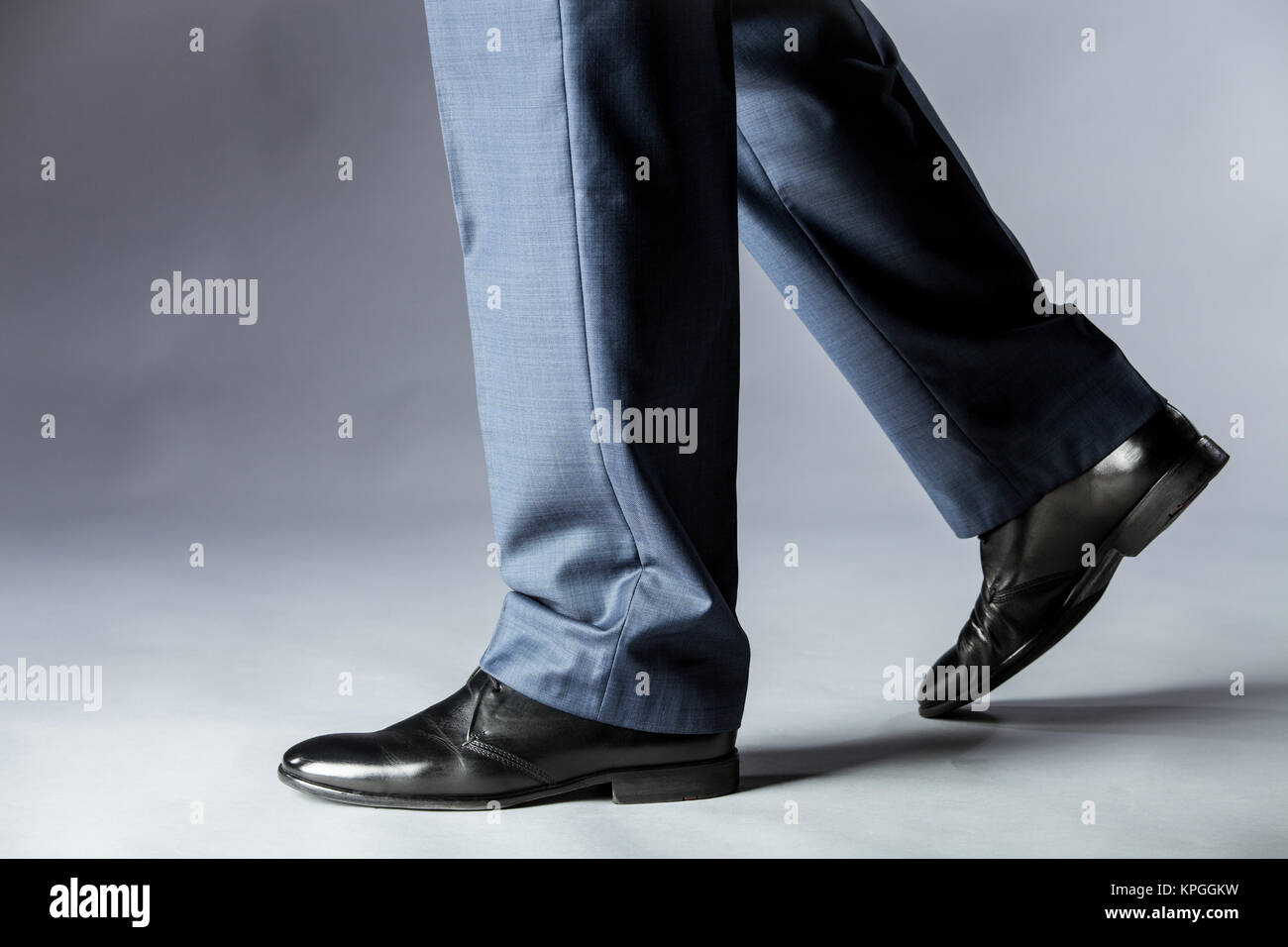 Feet of man in shoes Stock Photo - Alamy