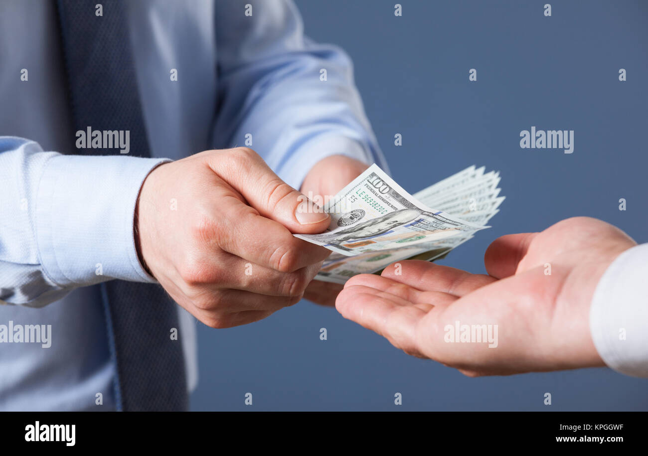 Human hands exchanging money Stock Photo - Alamy