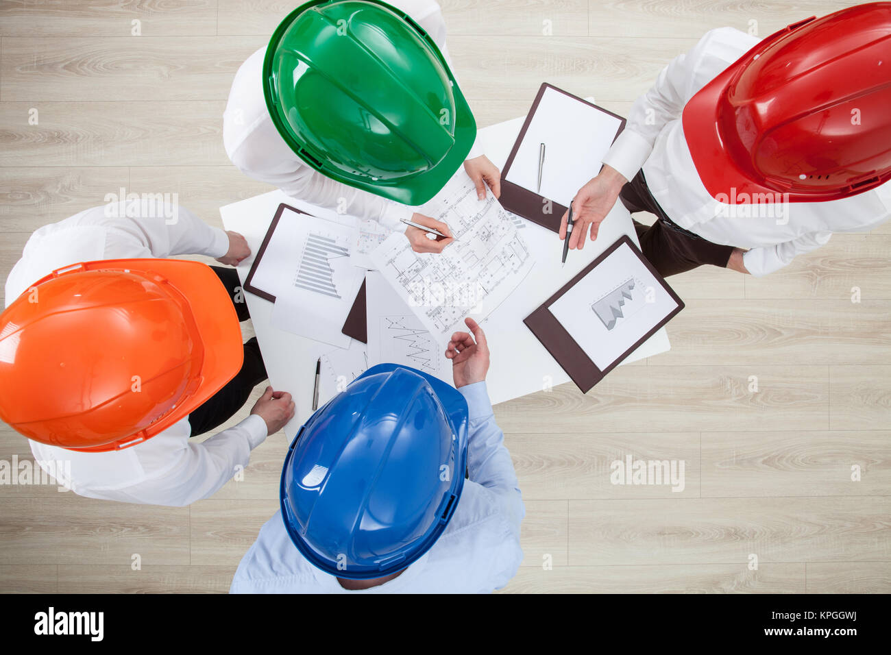 Group discussion in a construction company Stock Photo - Alamy