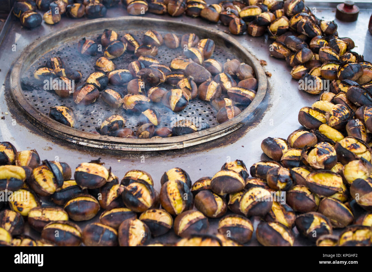 bunch of roasted chestnuts at street wendor Stock Photo - Alamy