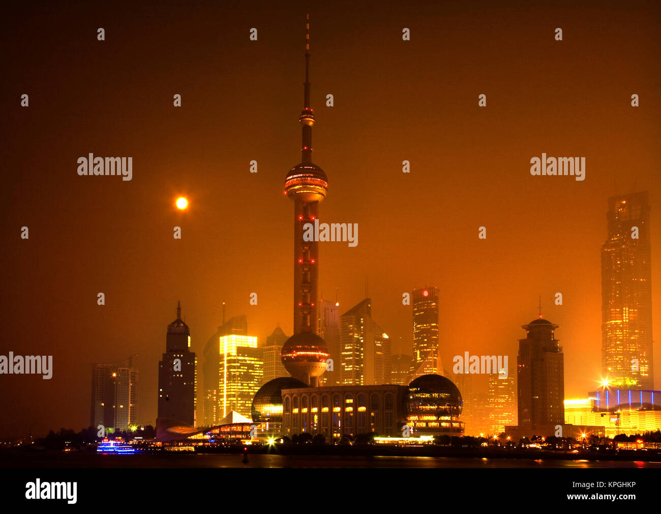 Skyline at Night with TV Tower with Moon in Orange Haze, Pudong ...
