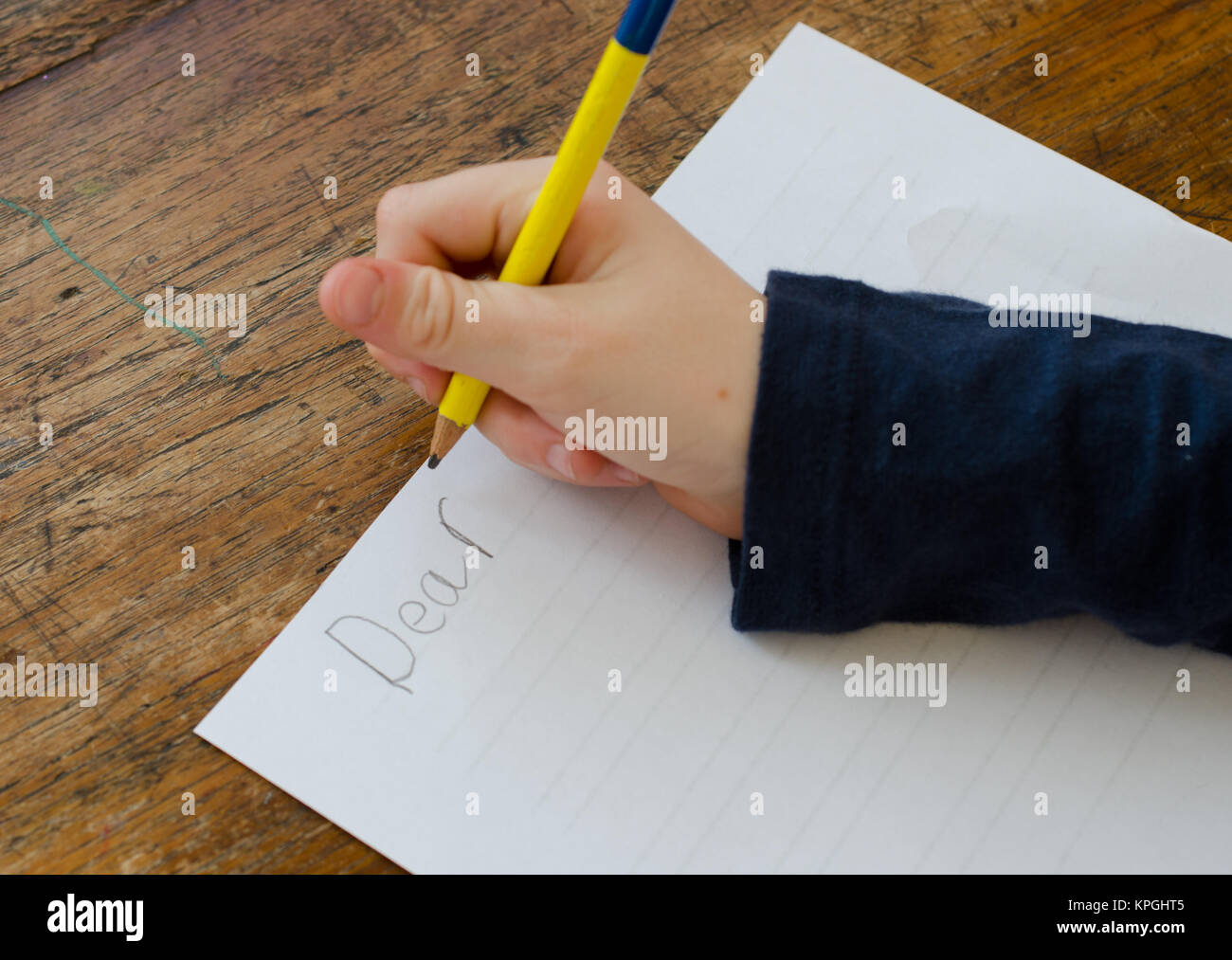 Child writing a letter Stock Photo - Alamy
