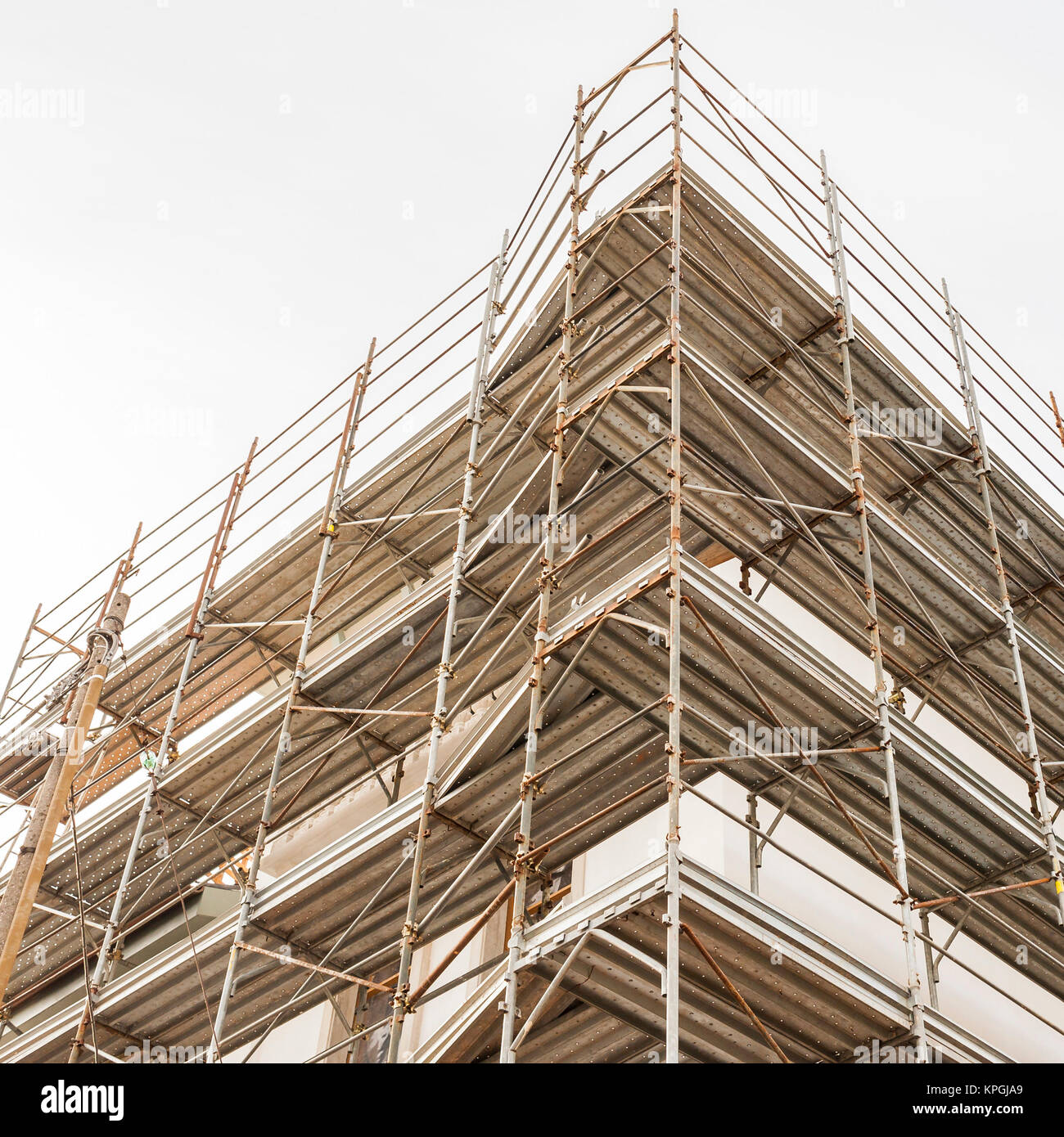 House for renovation with the scaffolding for bricklayers Stock Photo ...