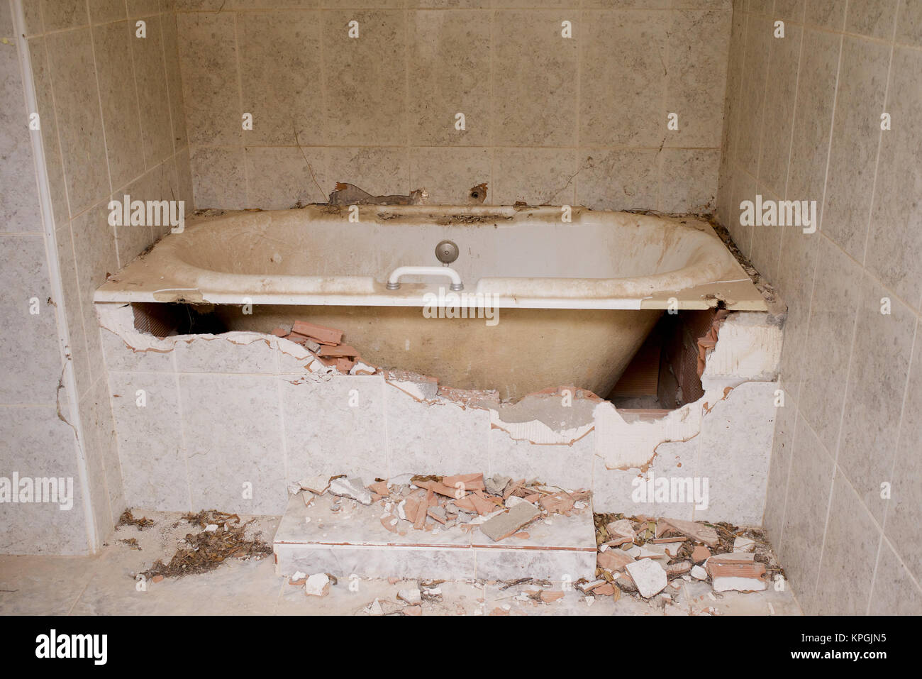 Smashed bath in a deserted villa in Spain Stock Photo - Alamy