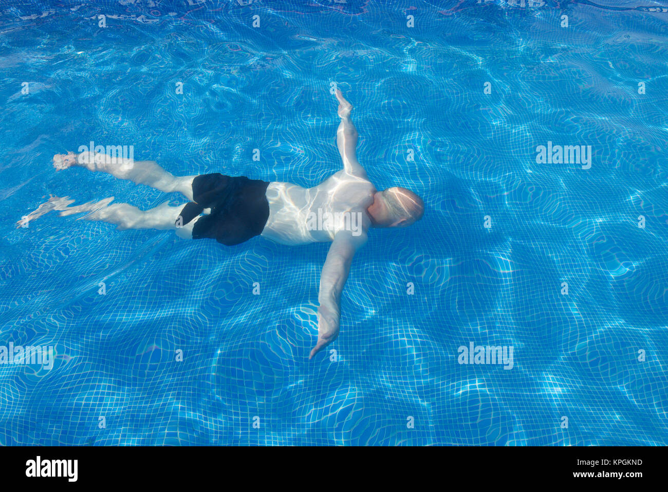 Man in a swimming pool Stock Photo - Alamy