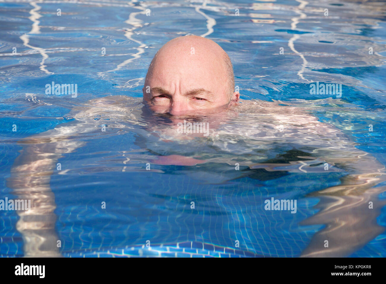 Man in a swimming pool Stock Photo - Alamy