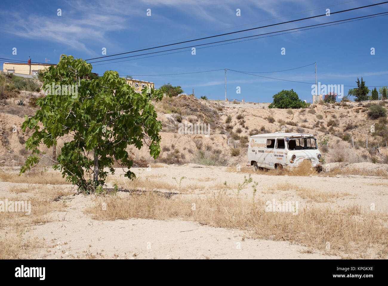Abandoned old white van in the countryside Stock Photo - Alamy