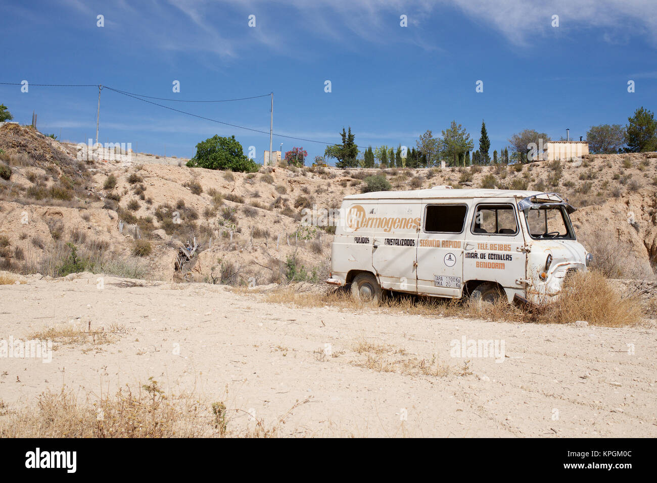 Abandoned old white van in the countryside Stock Photo - Alamy
