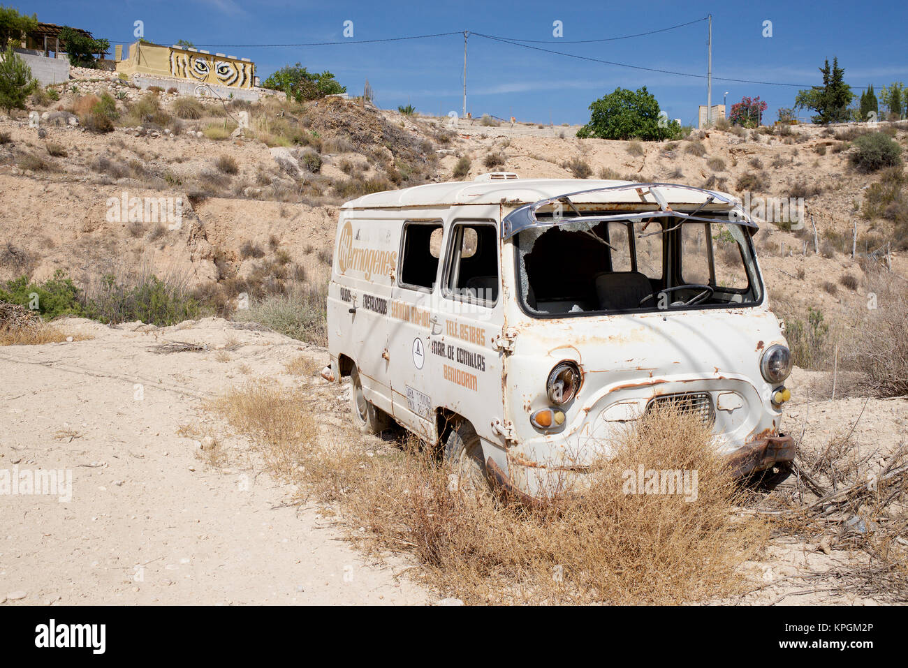 Abandoned old white van in the countryside Stock Photo - Alamy