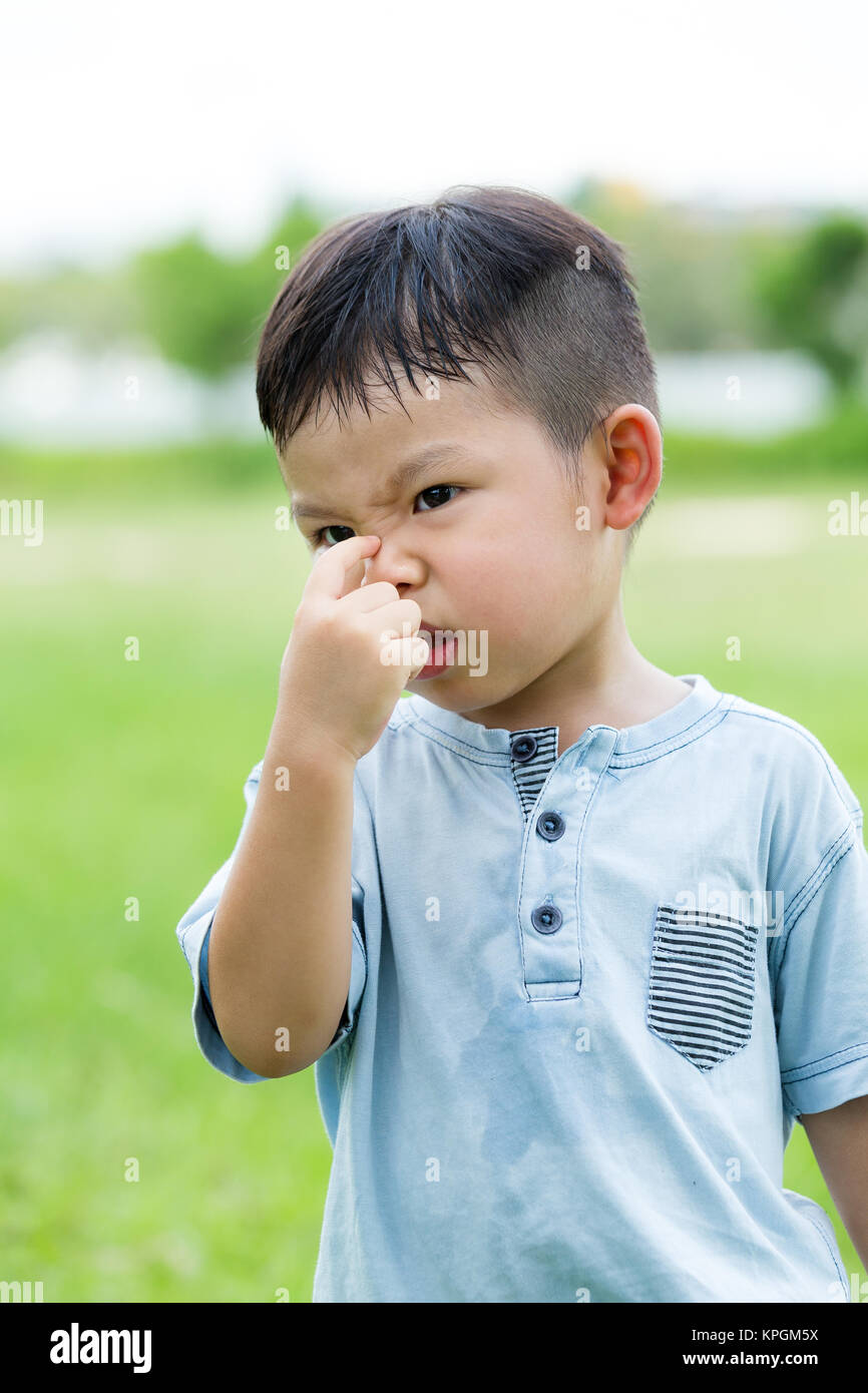 Kids smelling bad smell hi-res stock photography and images - Alamy
