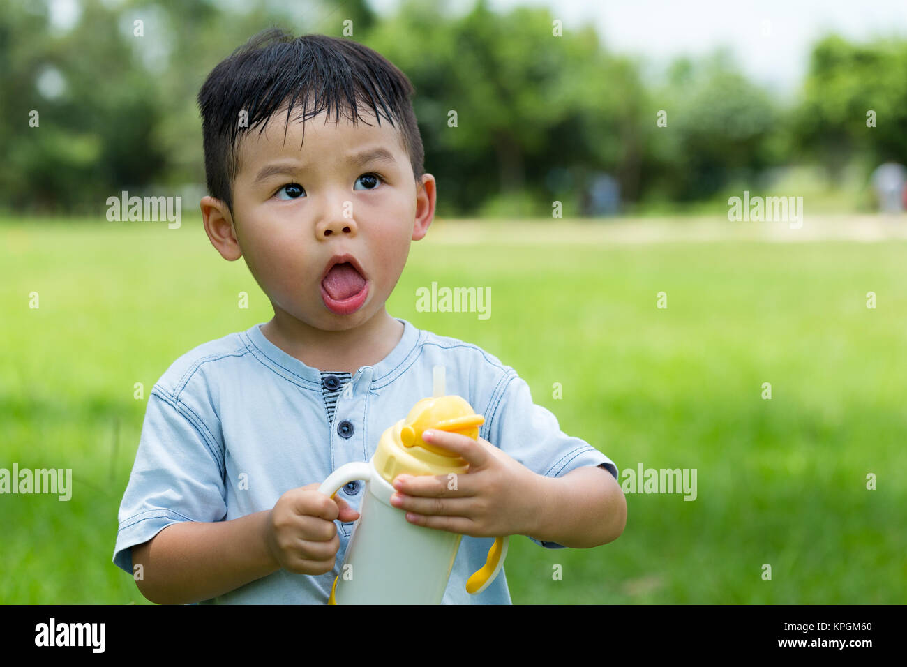 Little boy feeling thirsty Stock Photo - Alamy