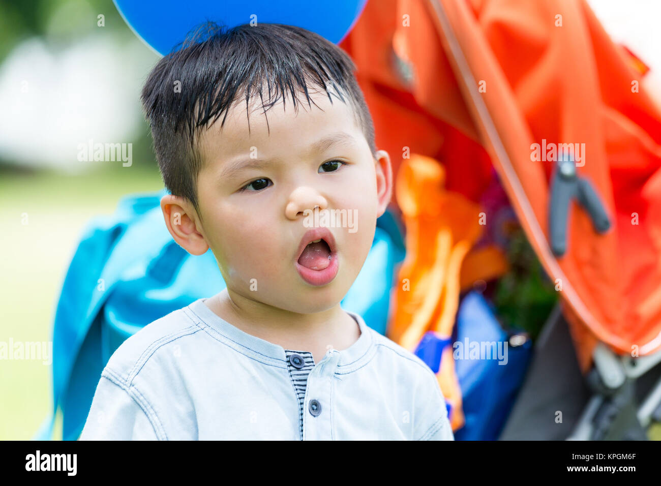 Baby boy feeling dislike Stock Photo - Alamy