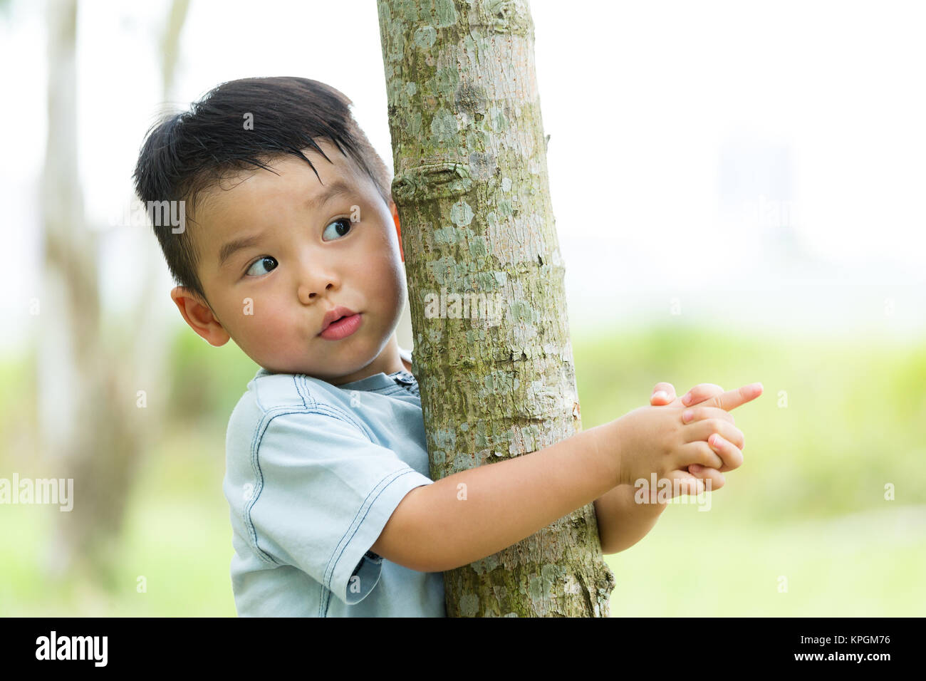 Baby boy smiles plays hi-res stock photography and images - Alamy