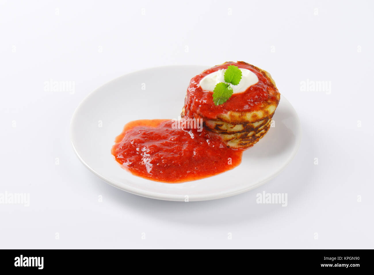 pancakes with strawberry puree Stock Photo - Alamy