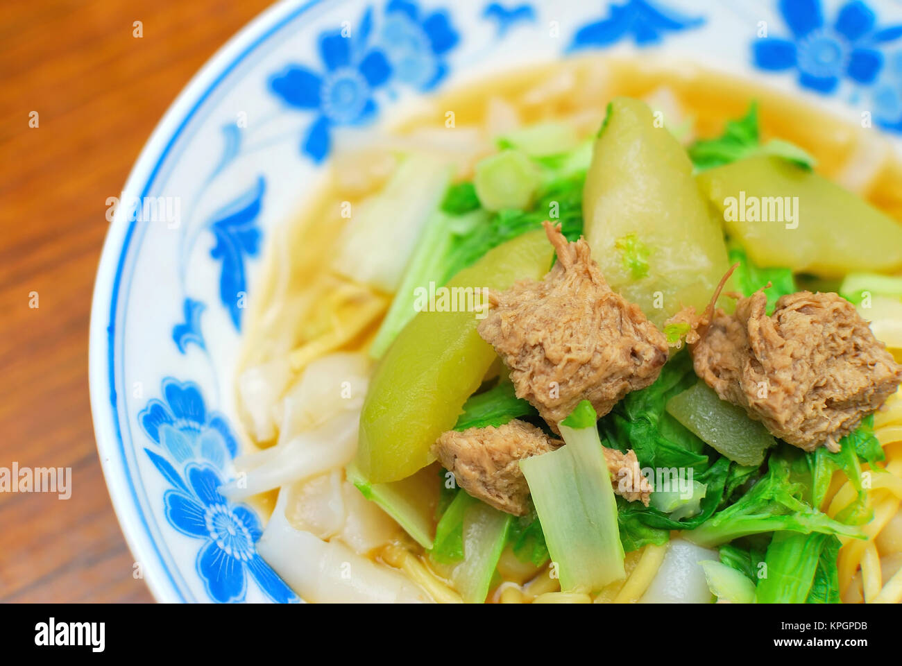 Sumptuous looking Chinese style vegetarian white noodles with mock meat ...