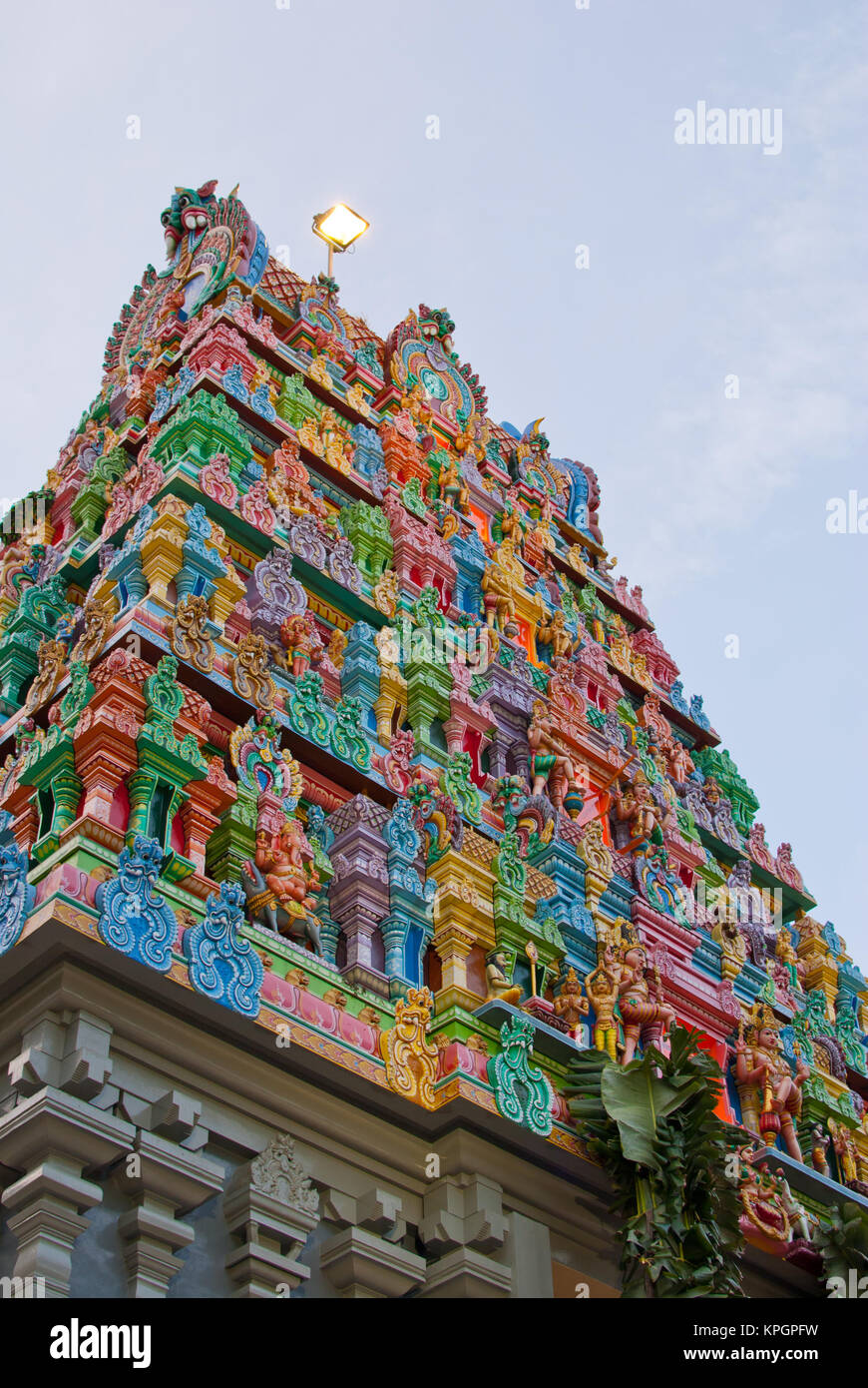 Generic Hindu temple with colorful and elaborate designs on the roof ...